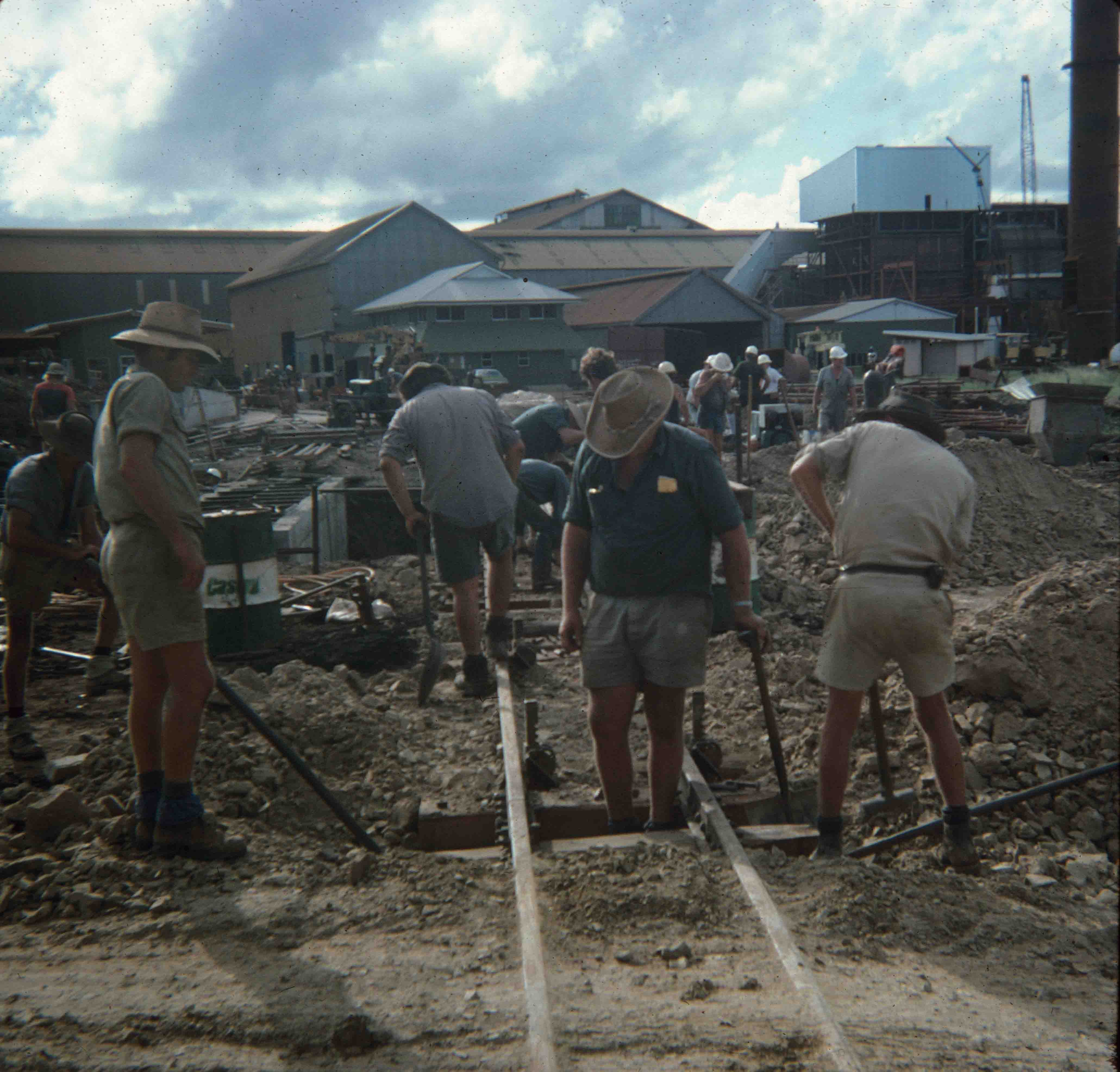 A gang working on sugar cane tram lines, Isis central sugar mill, 1976 ...